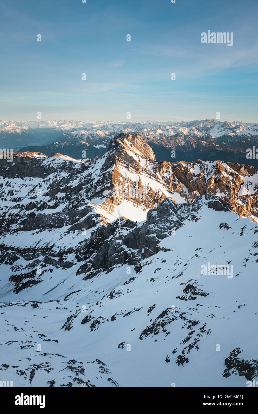 A vertical shot of the Swiss Alps. Beautiful snowy range Stock Photo ...