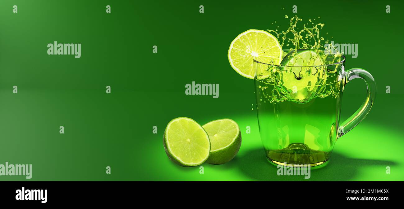 Half of a lime fruit dropped into a glass jug of lime juice making a ...
