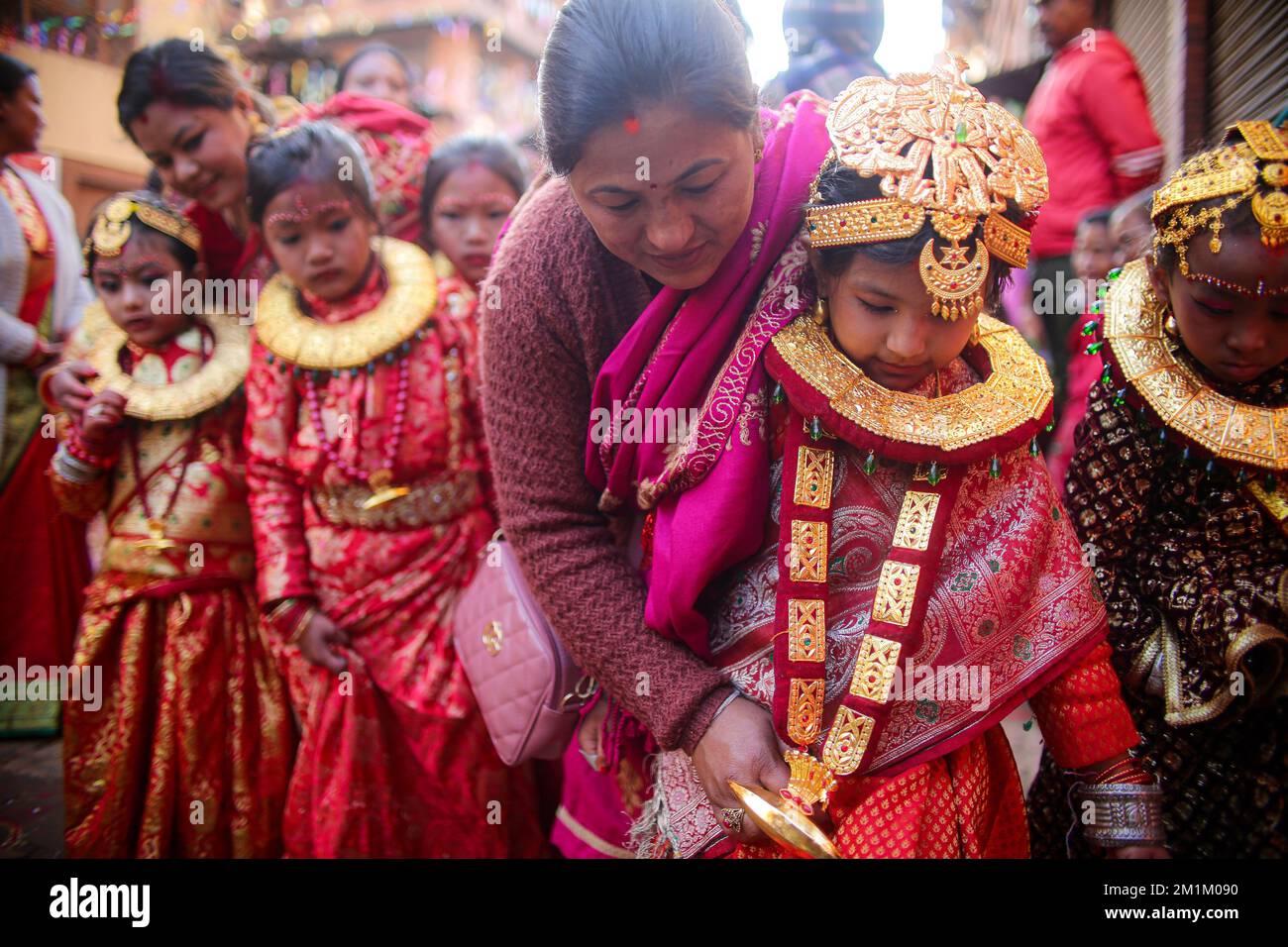 Nepal. 13th Dec, 2022. Girls from the Newa community dose a ritual ...