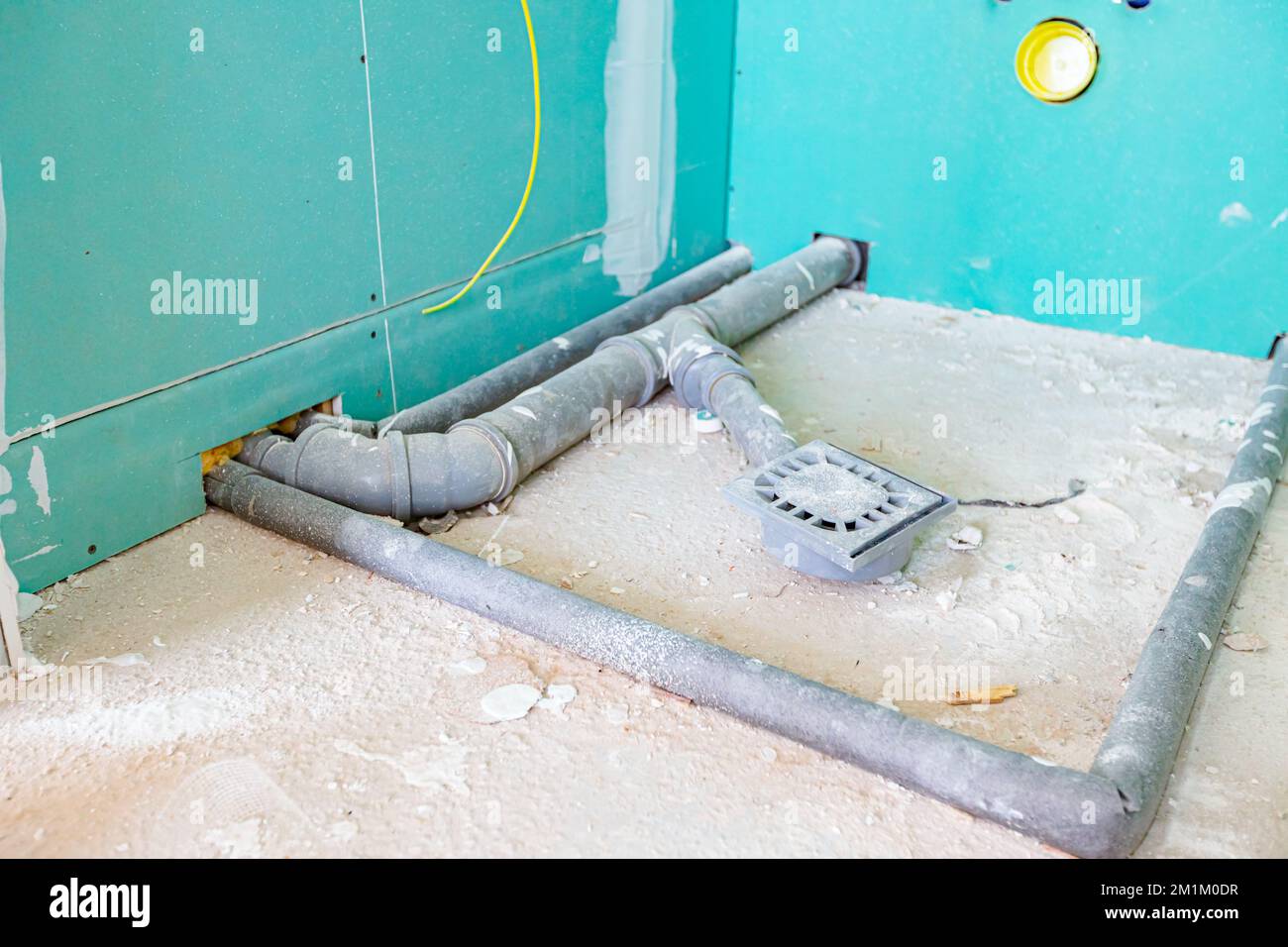 Water installation in the new unfinished bathroom, exposed mounted grey ...