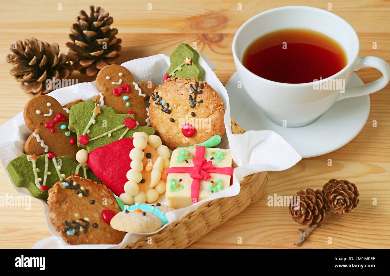 Closeup a Basket of Christmas Cookies and a Cup of Hot Tea on Wooden ...