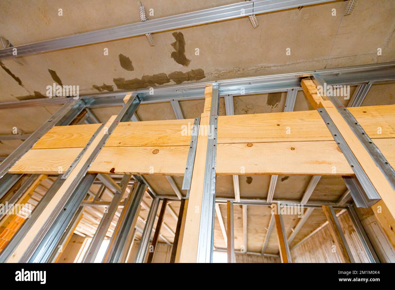 View at framework of metal and wooden vertical profile pillars for ...