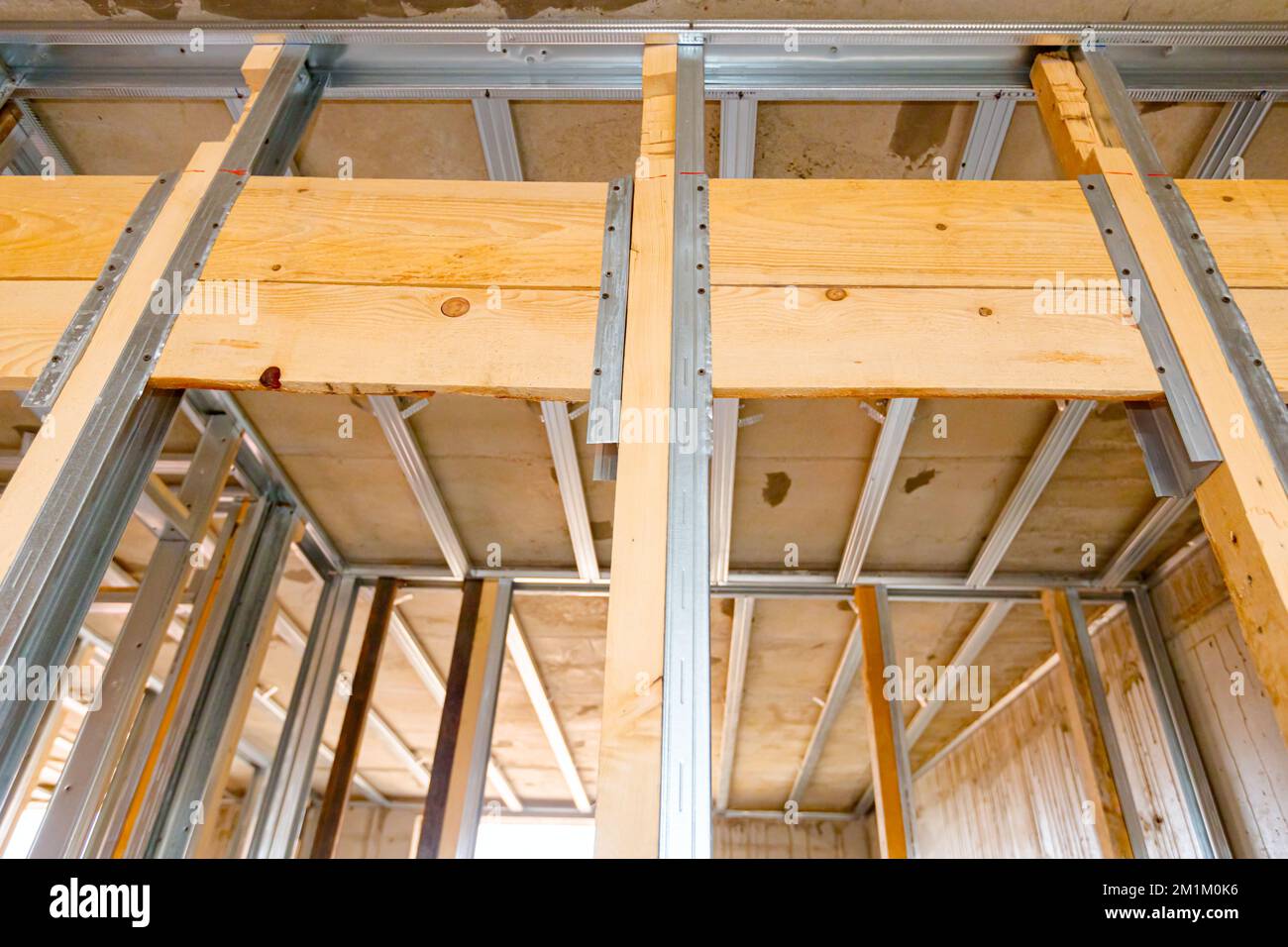 View at framework of metal and wooden vertical profile pillars for ...