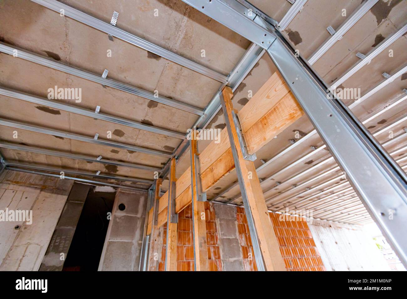 View at framework of metal and wooden vertical profile pillars for ...