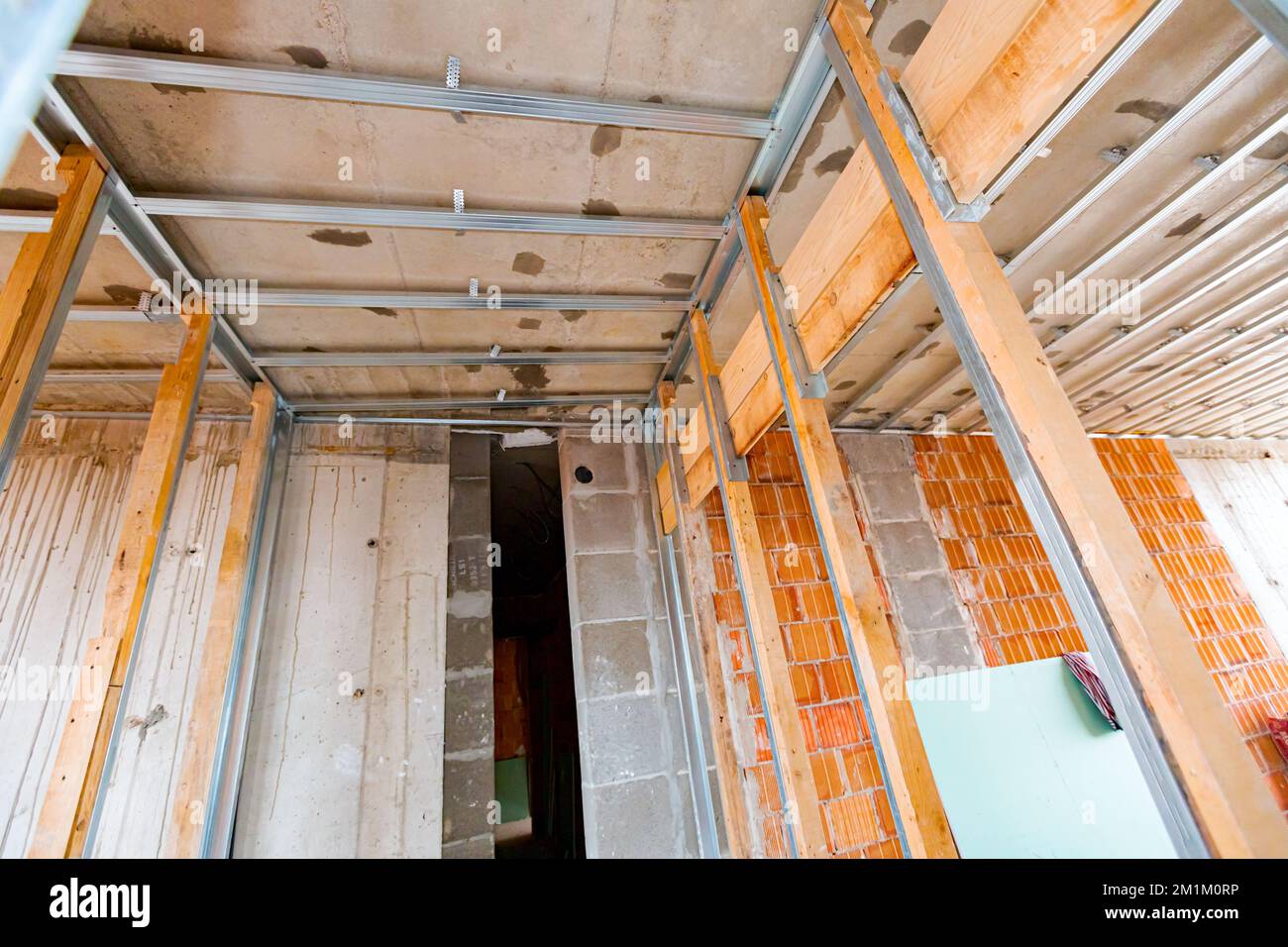 View at framework of metal and wooden vertical profile pillars for ...