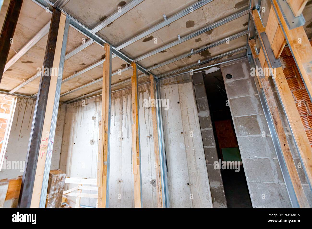 View at framework of metal and wooden vertical profile pillars for ...