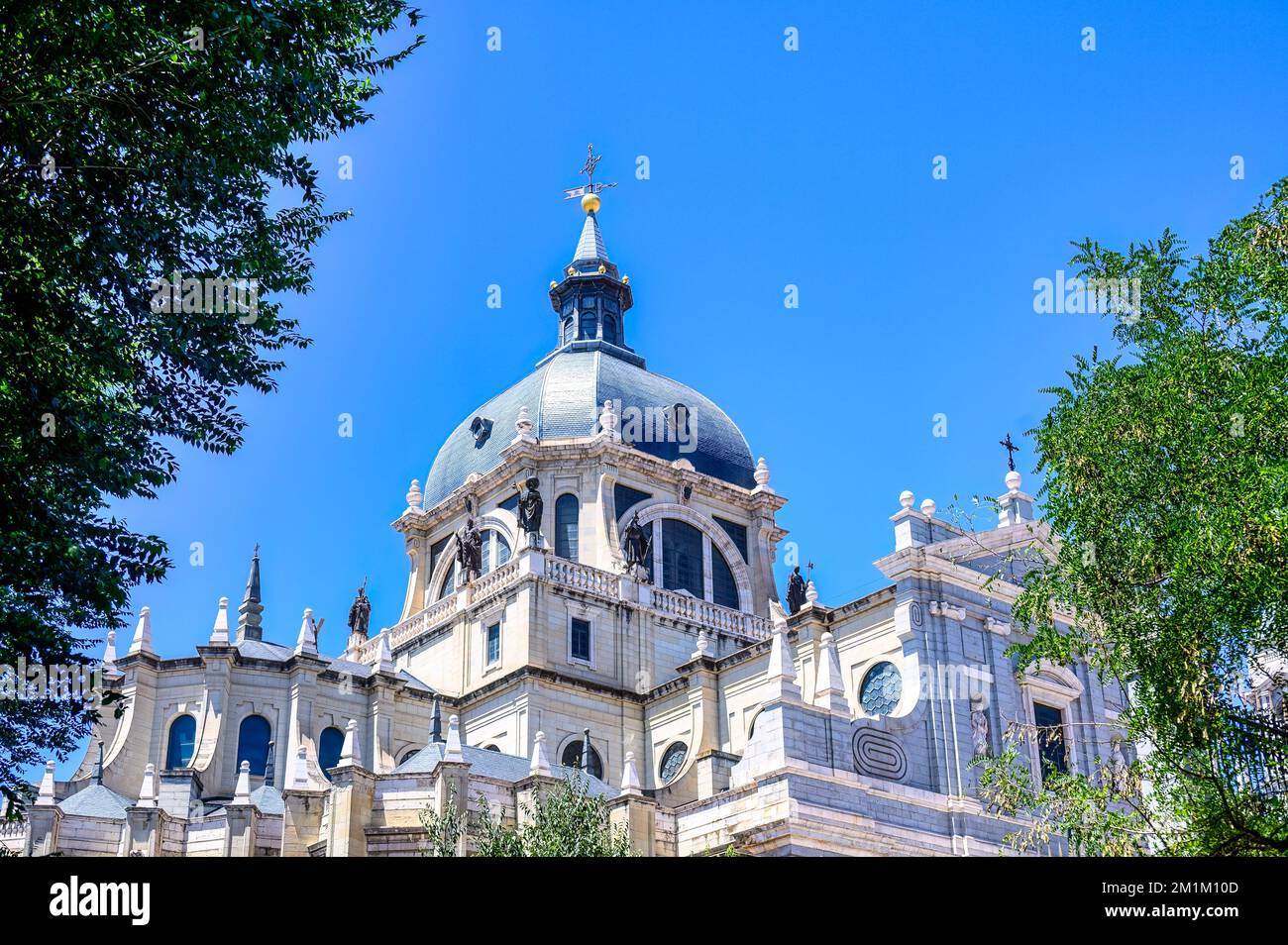 Almudena Cathedral. Exterior building architecture featuring the large ...