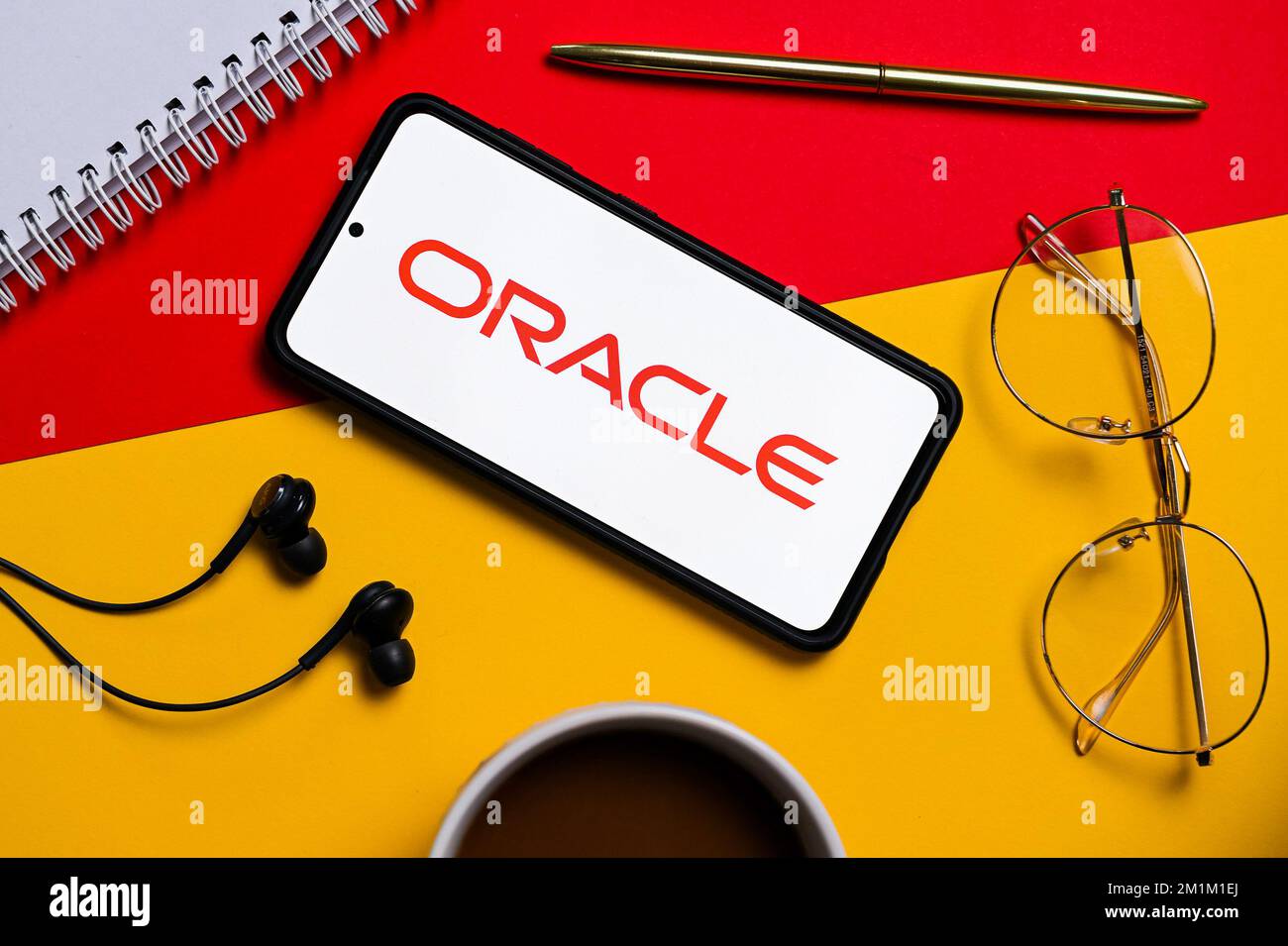In this photo illustration, an Oracle logo seen displayed on a ...
