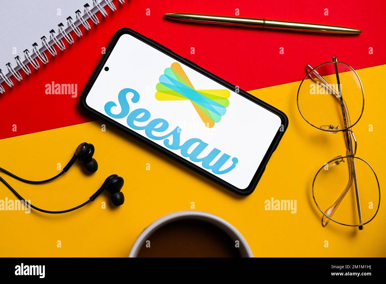 In this photo illustration, a Seesaw logo seen displayed on a ...