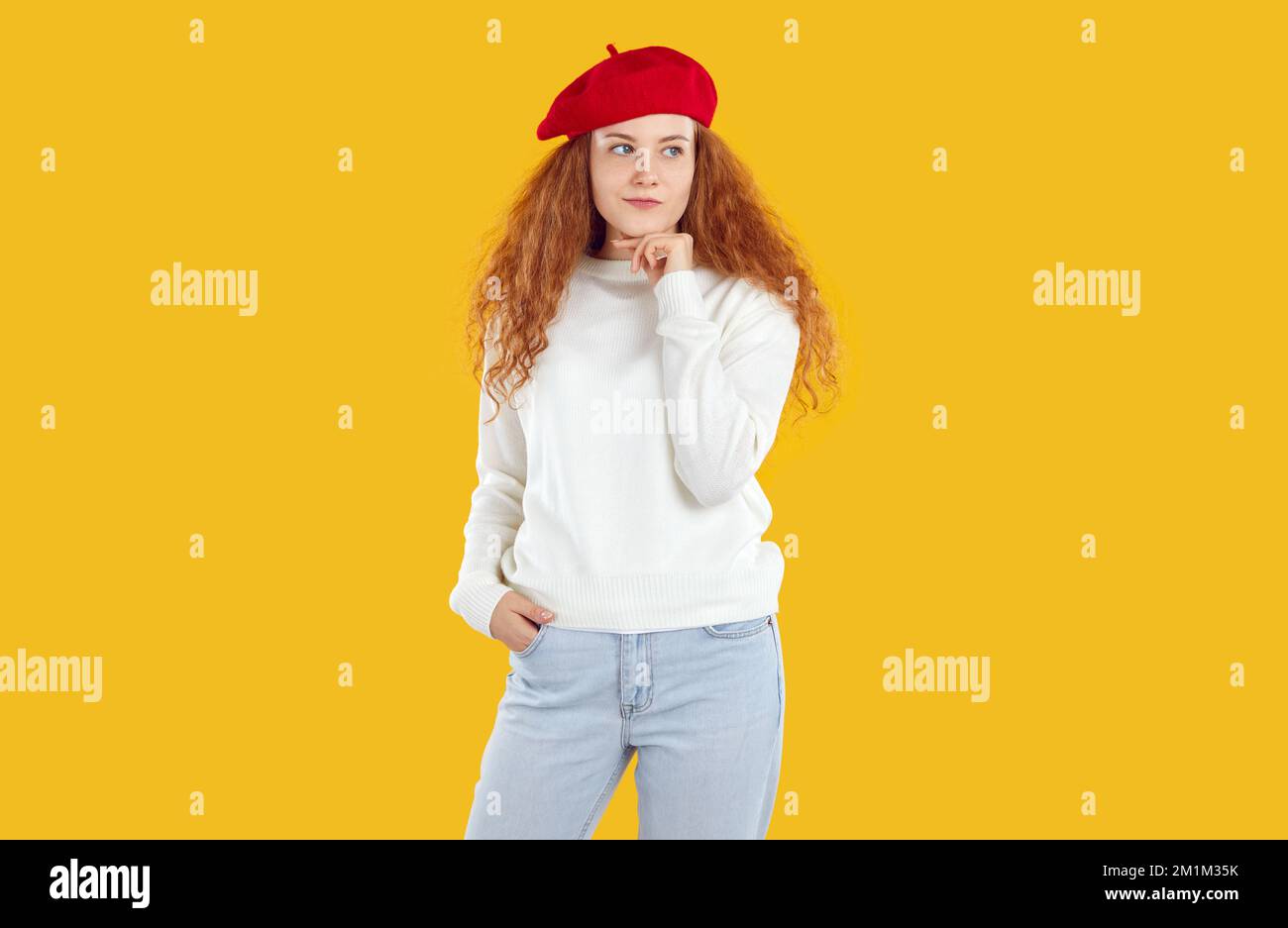 Curly Redhead Thoughtful Girl In Red Beret White Sweater And Jeans