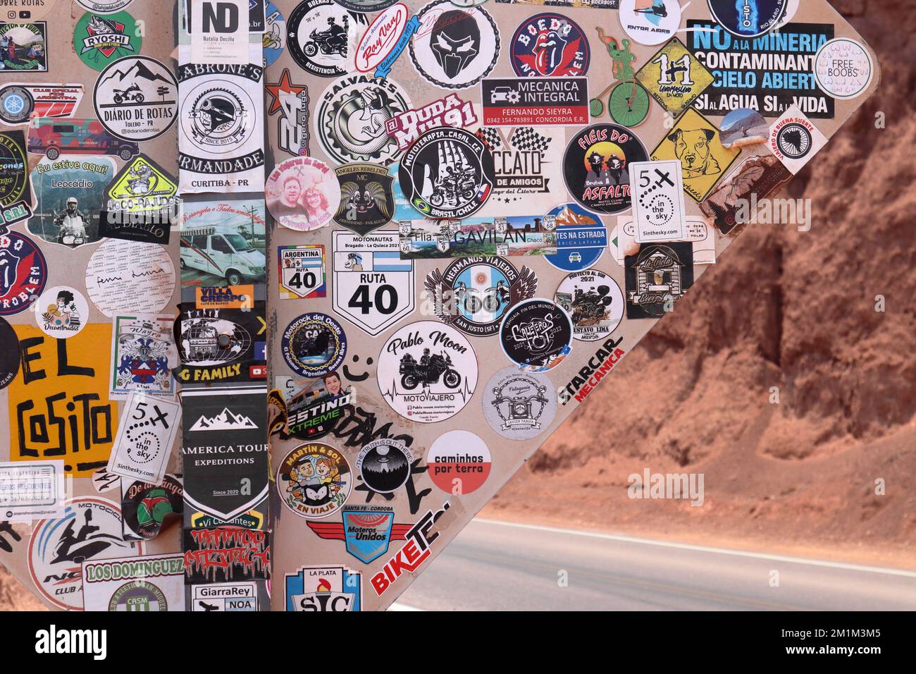 Road sign full of stickers of travelers on the side of route 68 in ...