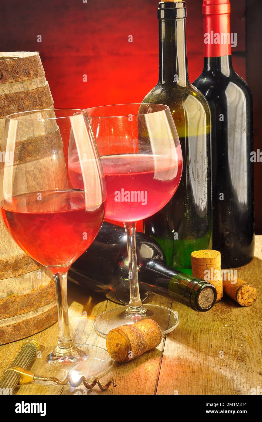 Glass and bottle of wine on the table Stock Photo - Alamy