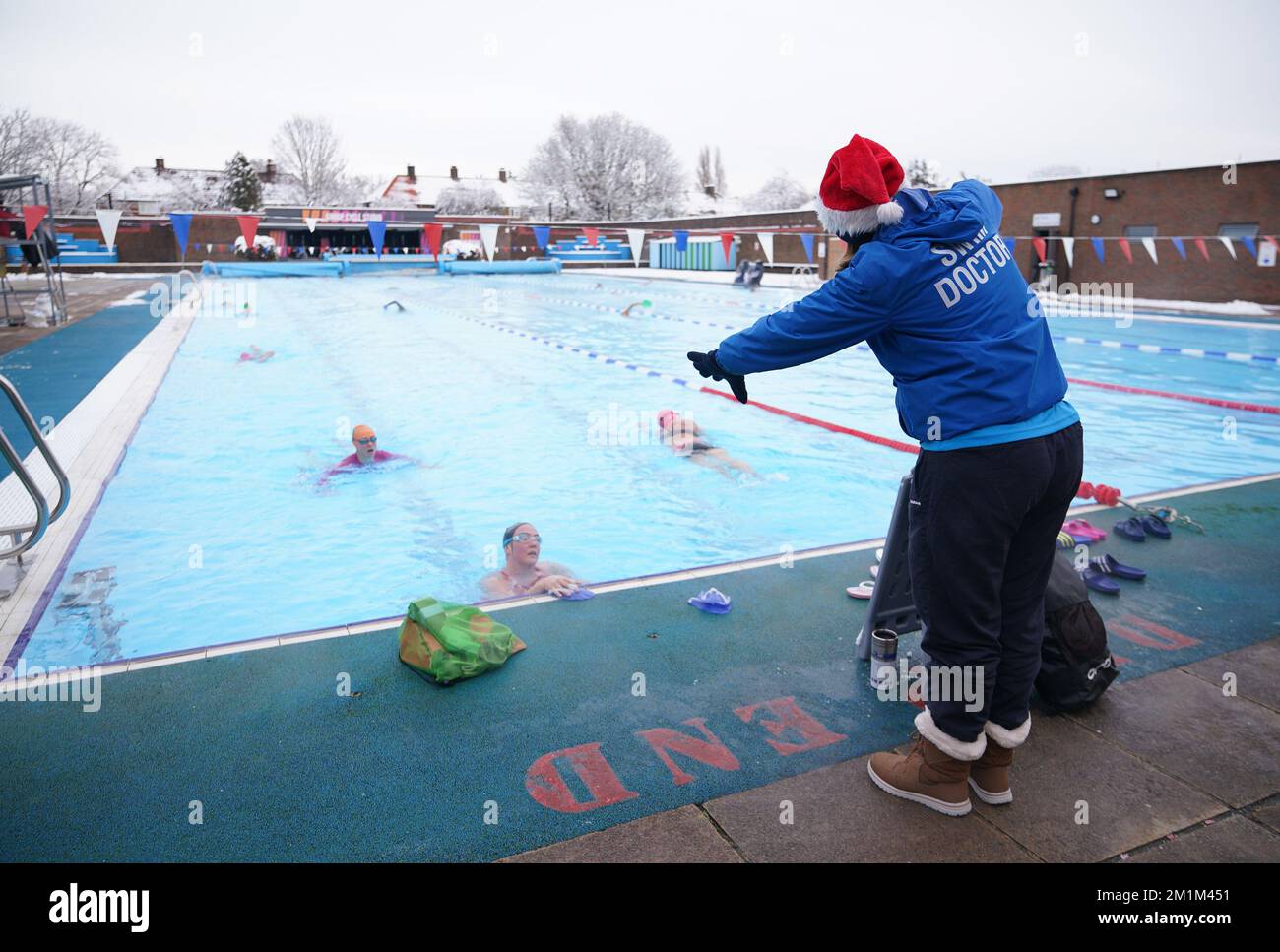 Swim Doctor Tracy White coaching a class of early morning swimmers at ...