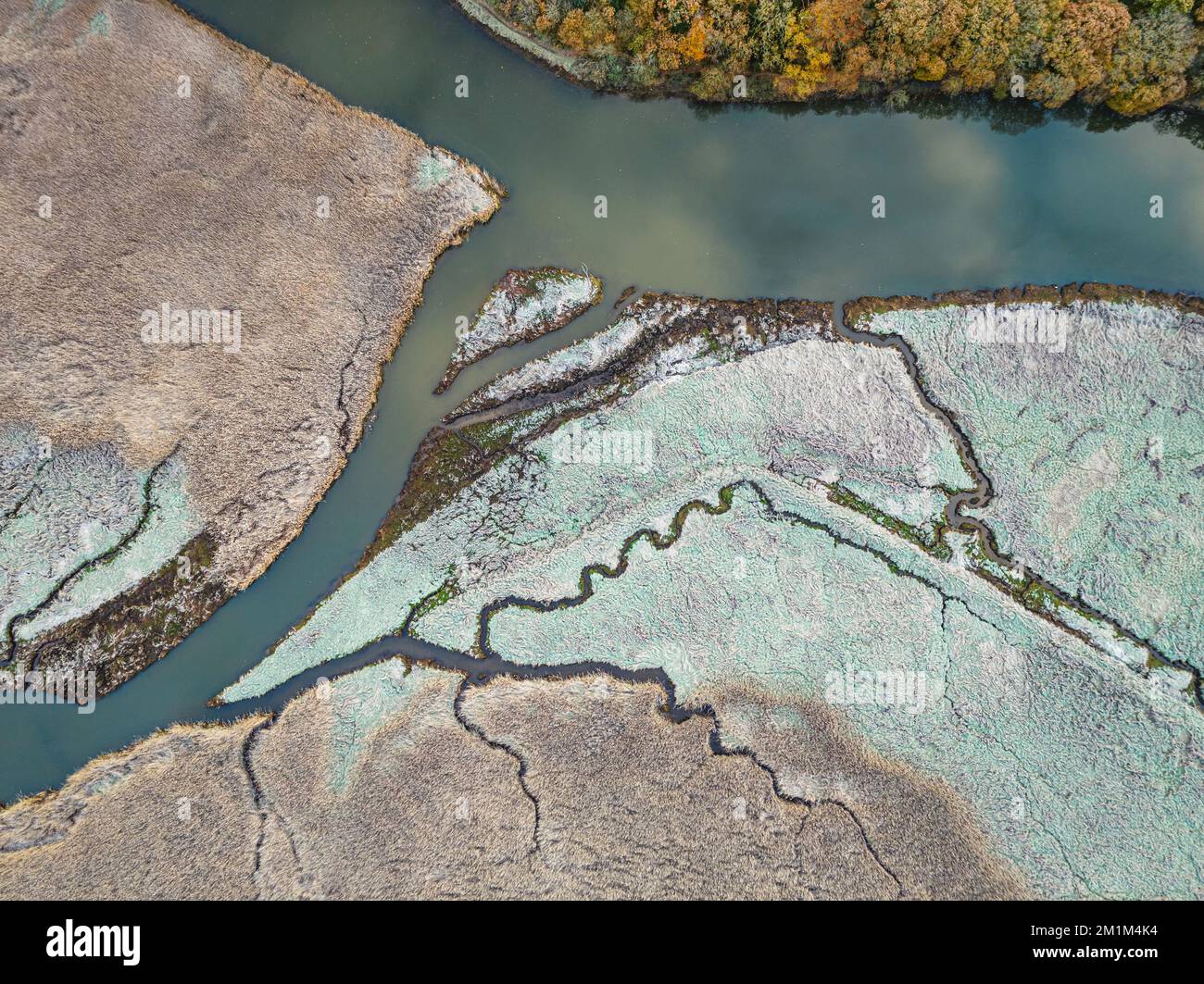 Top Down view over Marshland of River Teign shrouded in frost at ...
