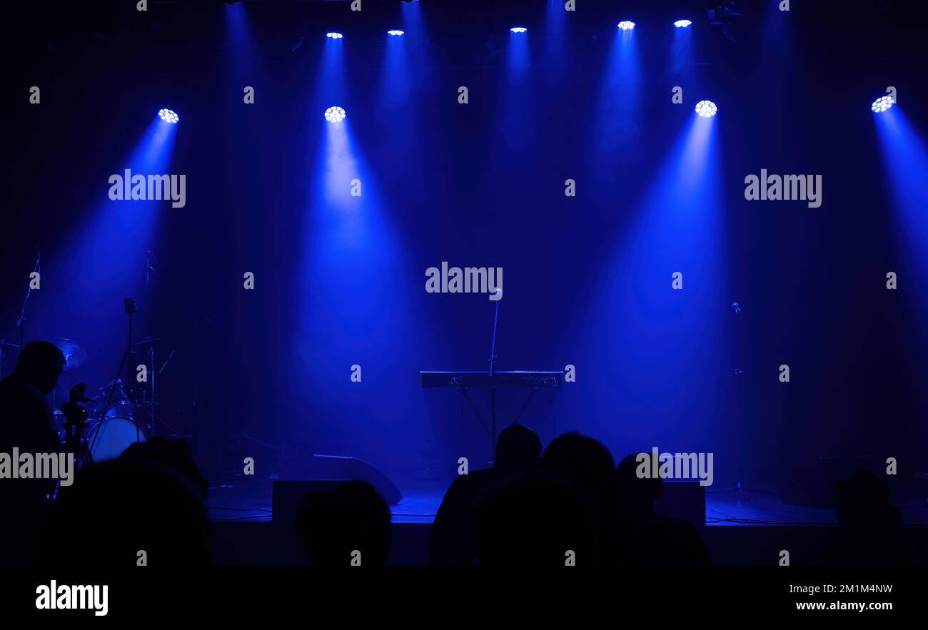 Light on a free stage, scene with blue spotlights scene Stock Photo - Alamy