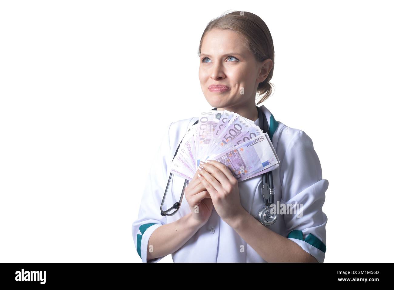 Portrait of female doctor holding money Stock Photo - Alamy
