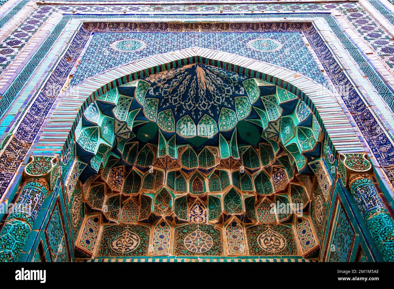 Traditional uzbek pattern on the ceramic tile on the wall of the mosque ...