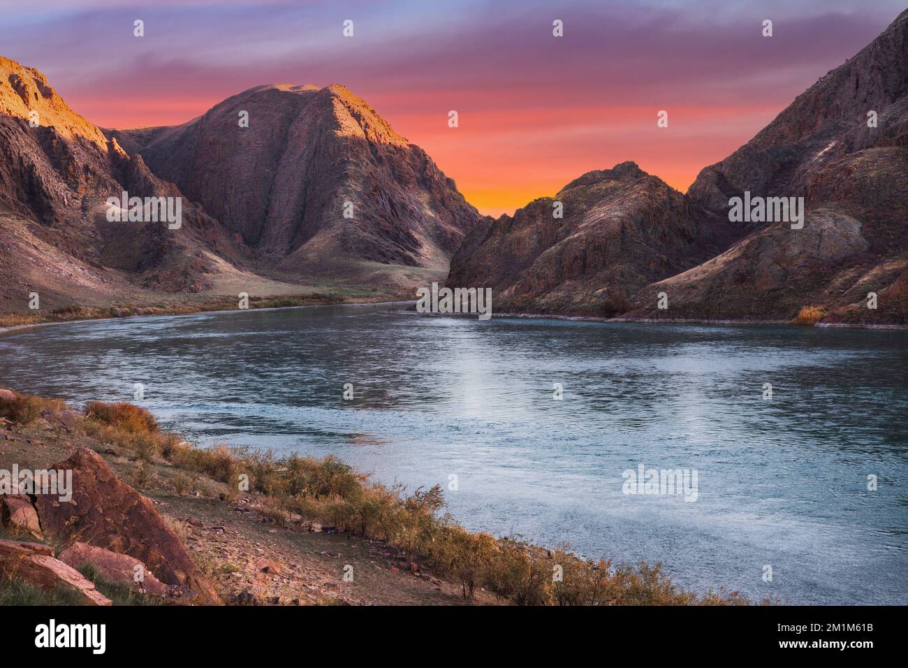 Ili river view in rocky gorge on sunrise sky background, Almaty region ...