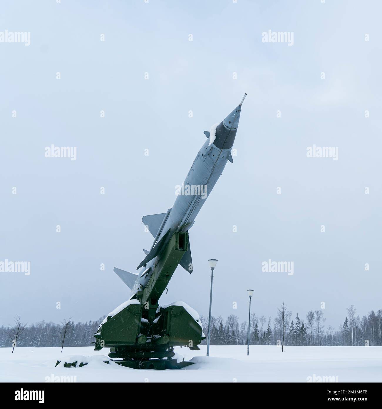 rockets in the winter forest. ground-to-air missiles on snow in winter ...