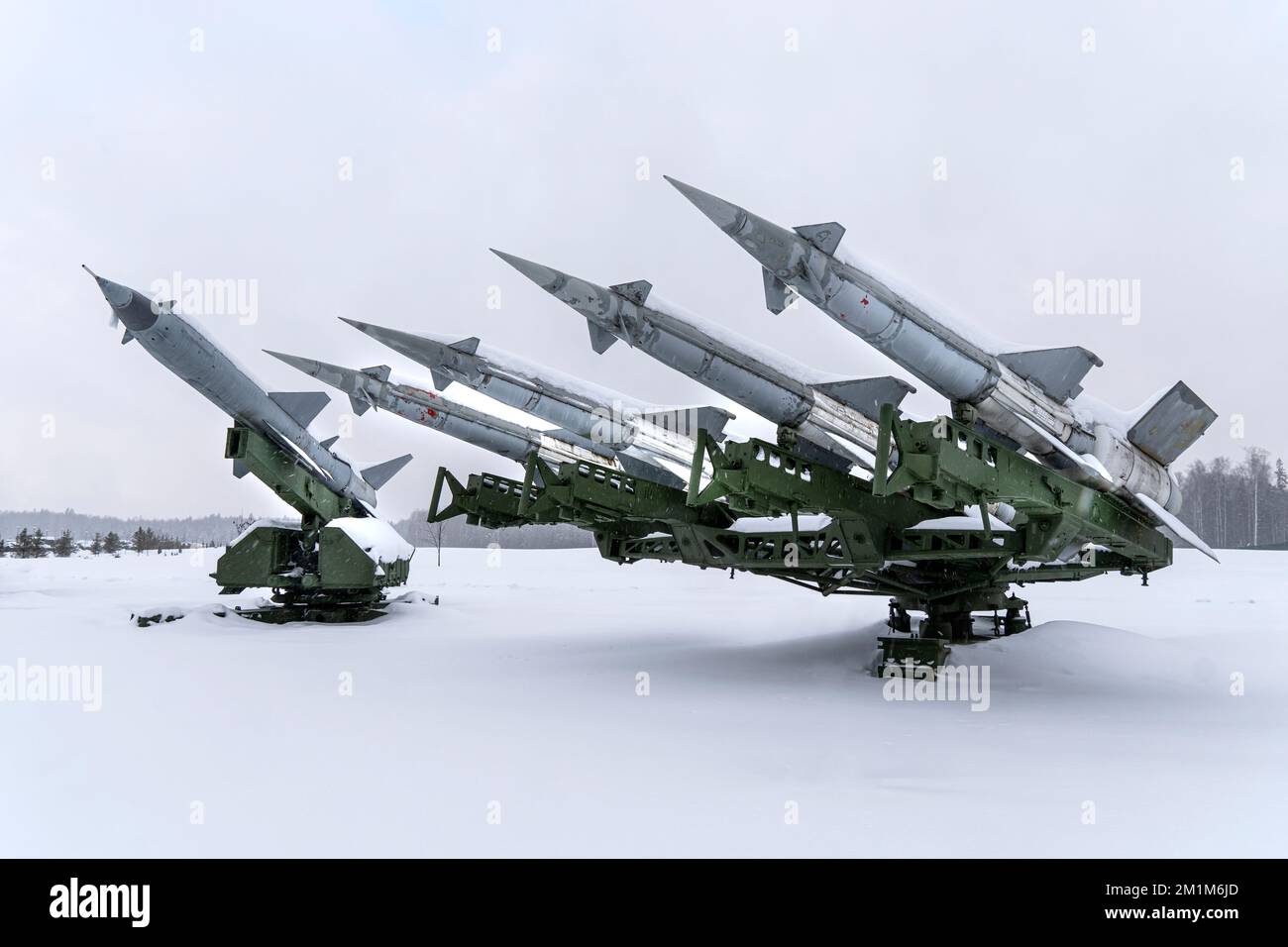 rockets in the winter forest. ground-to-air missiles on snow in winter ...