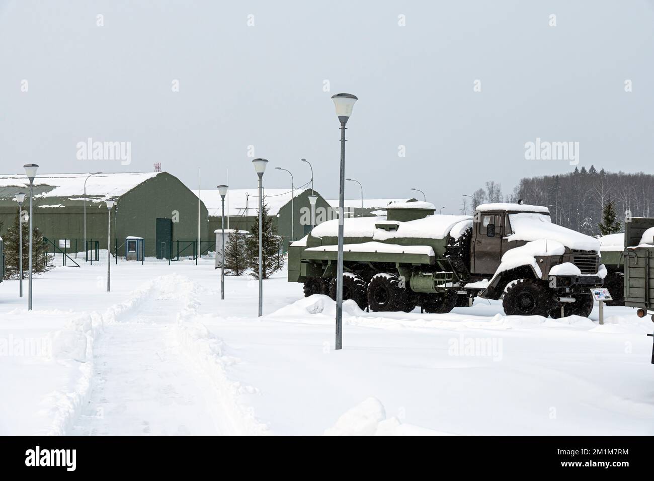 an old Russian military truck at the base in the snow in winter Stock ...
