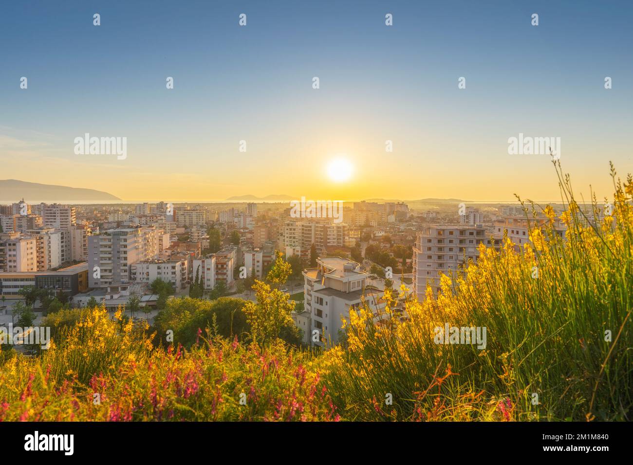 Aerial view of the cityscape and tiled roofs of the old city of Vlore ...