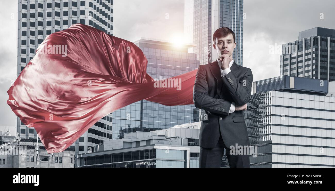 Concept of power and sucess with businessman superhero in big city ...