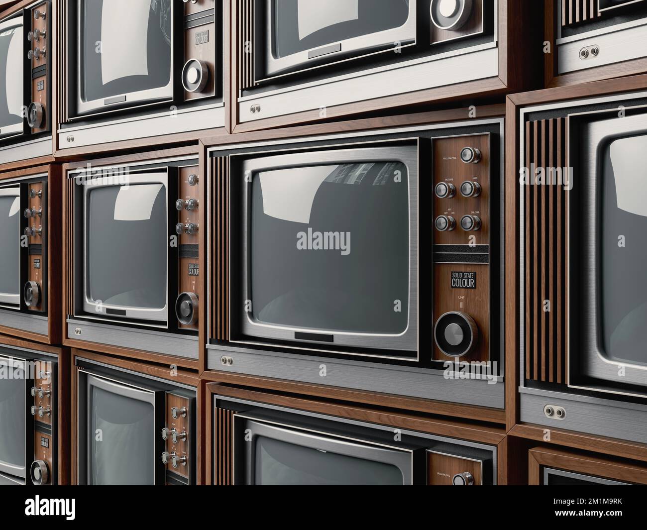 A stacked wall of old vintage tube televisions with wood trim and ...