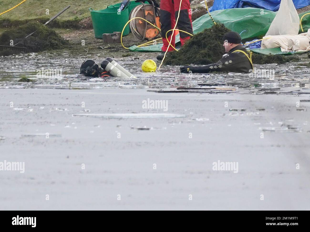 Police divers search the lake in Babbs Mill Park in Kingshurst ...