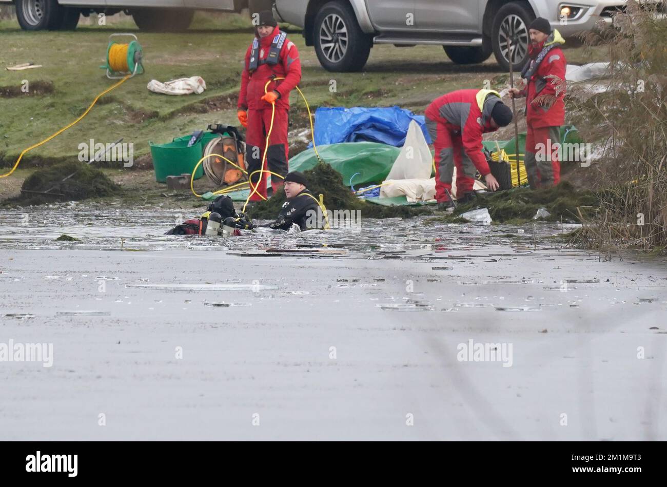 Police divers search the lake in Babbs Mill Park in Kingshurst ...