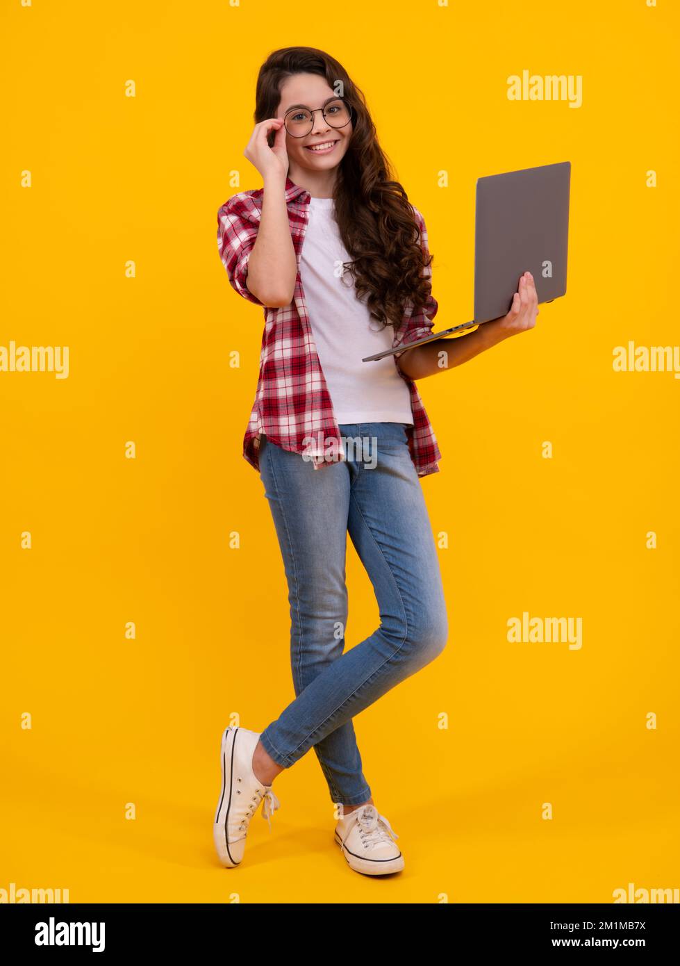 Student school girl with laptop on isolated studio background. Video ...