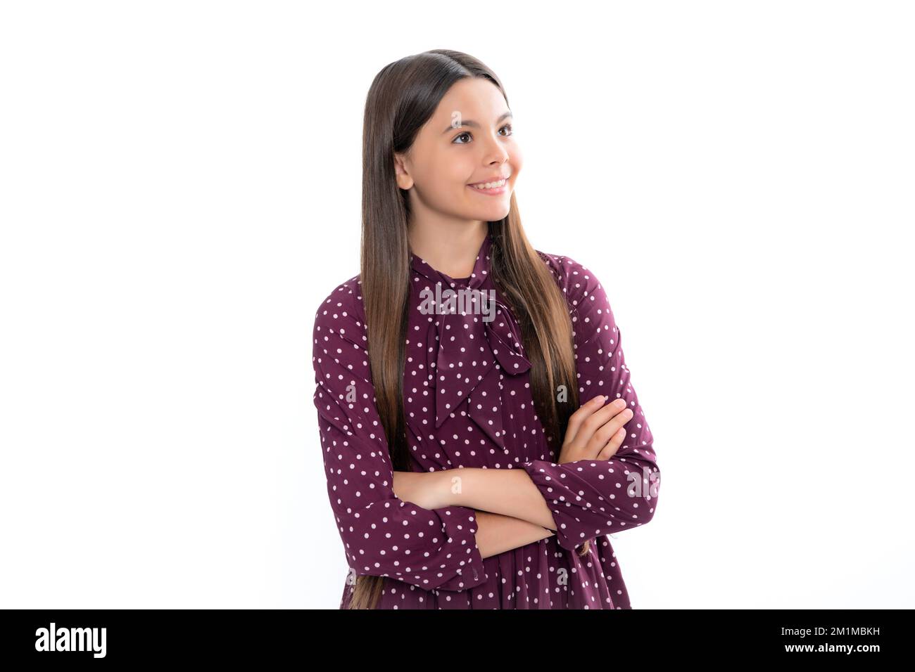 Portrait of happy smiling teenage child girl. Pretty teenage girl in white studio background ...