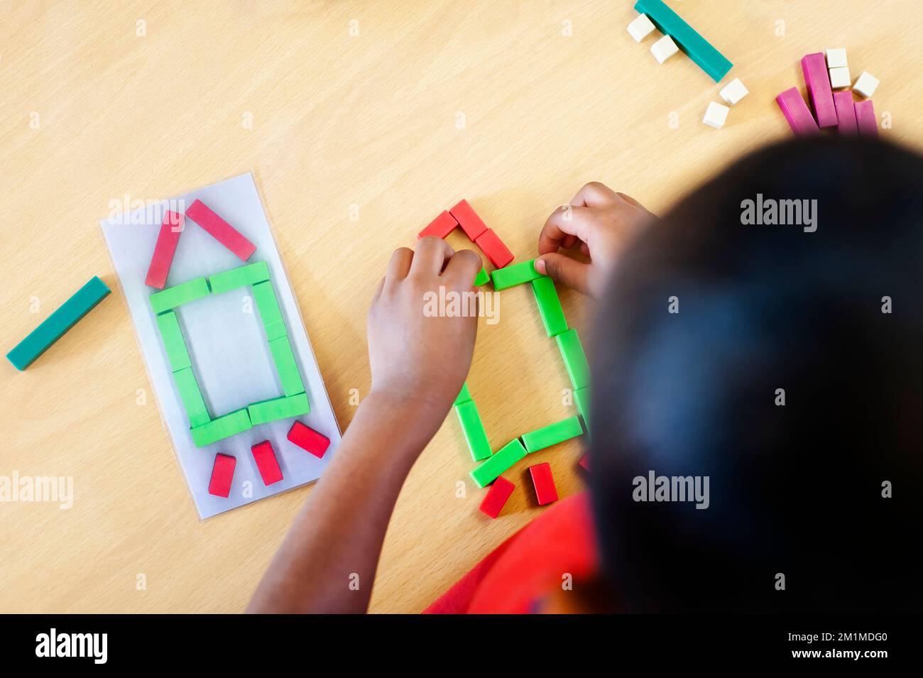 School child using Cuisenaire Rods Stock Photo - Alamy