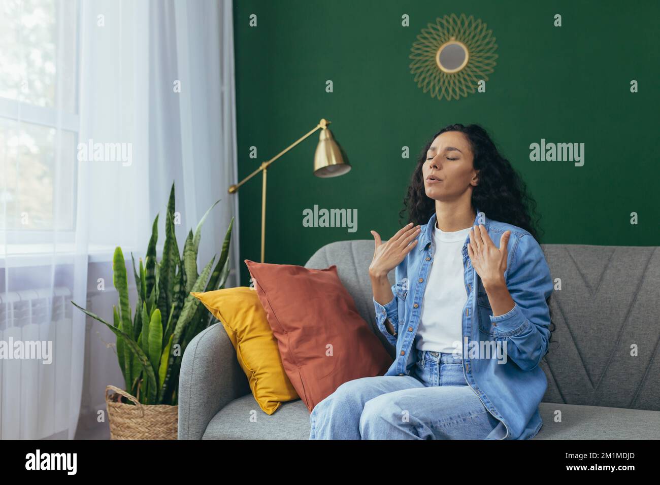 Panic attack woman alone at home scared hispanic woman having trouble ...