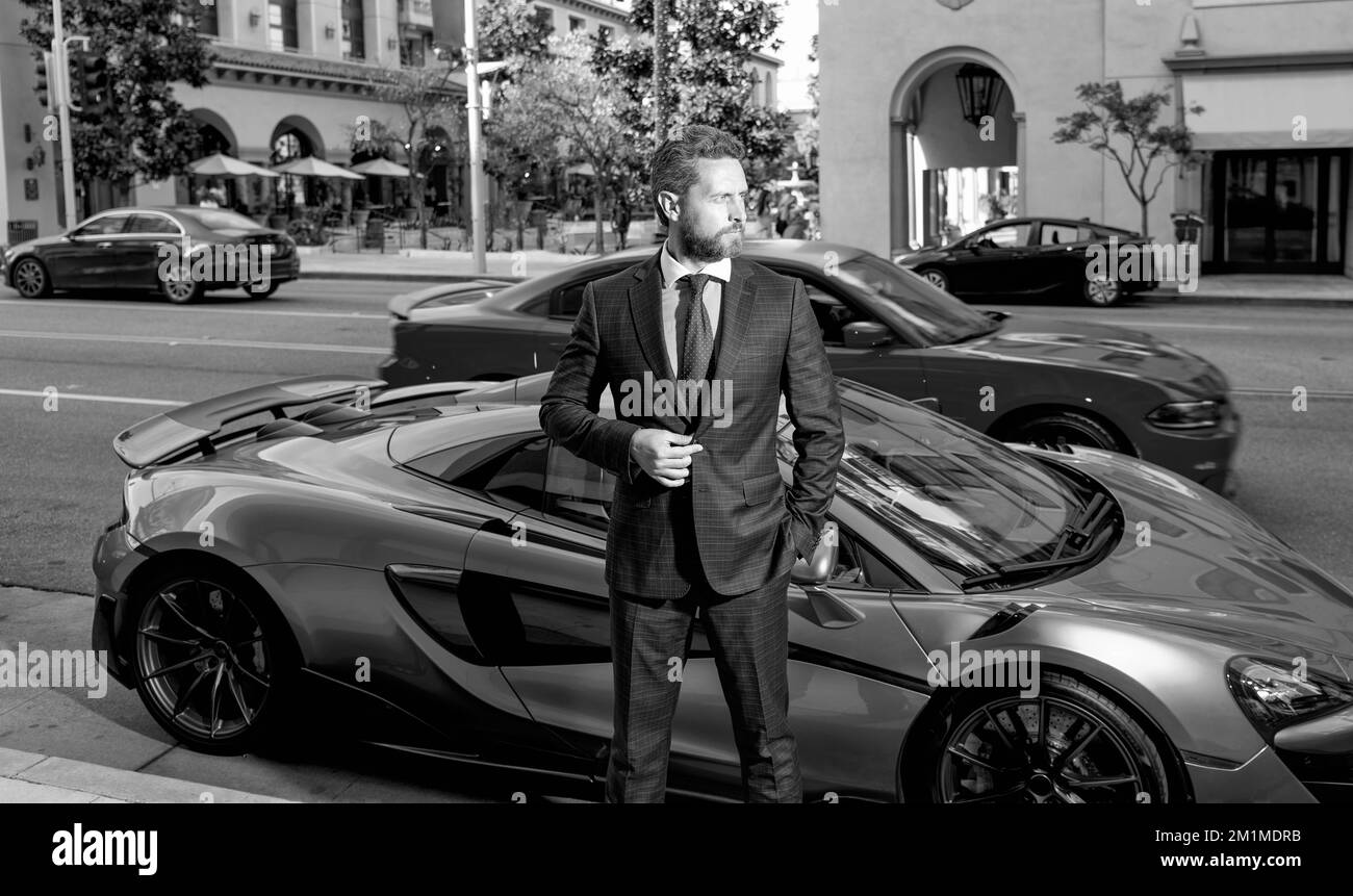 Businessman standing outdoors Black and White Stock Photos & Images - Alamy