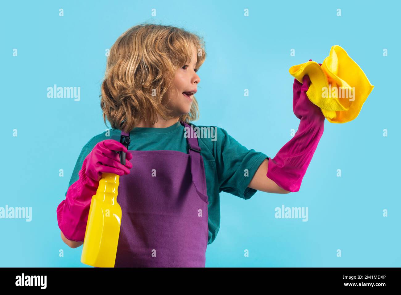 Child cleans at home concept. Kid cleaning with mop to help with ...