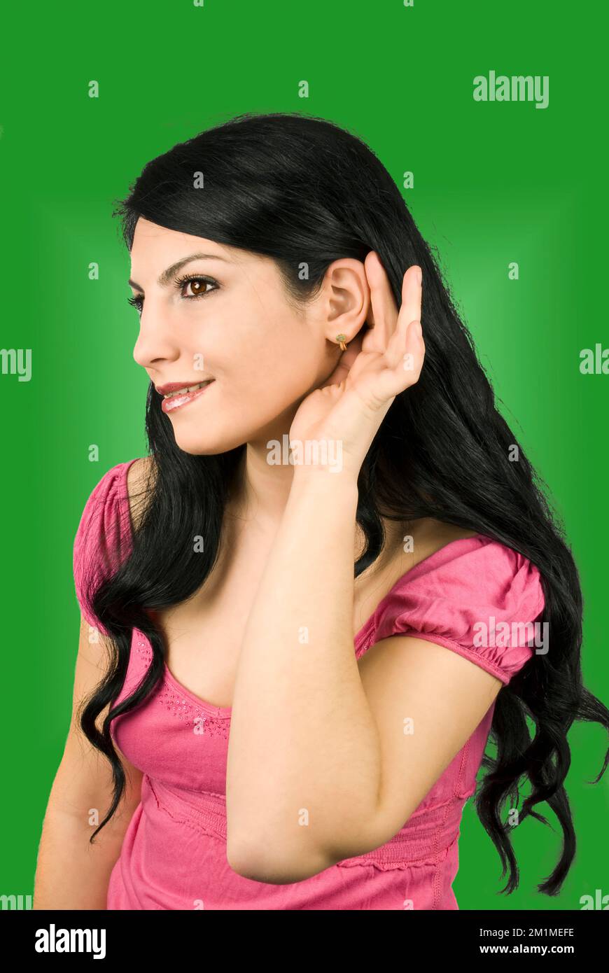 Beauty woman listening you standing with hand to ear to hear better and ...