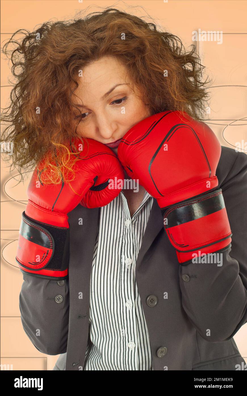 Sad loser business woman wearing boxing gloves isolated on white ...