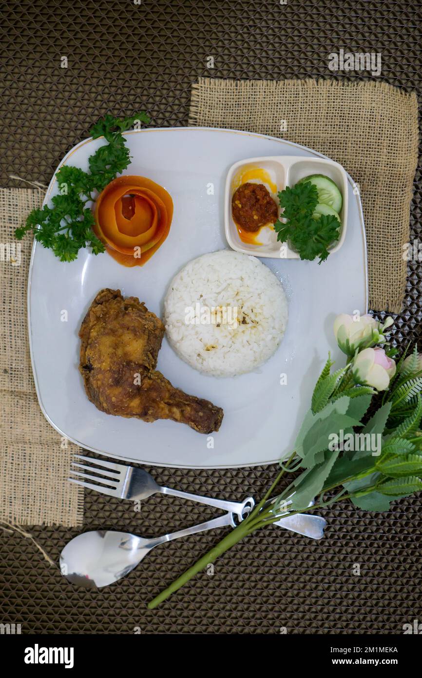 Homemade Indonesian Food, chicken butter with white rice, vegetables ...
