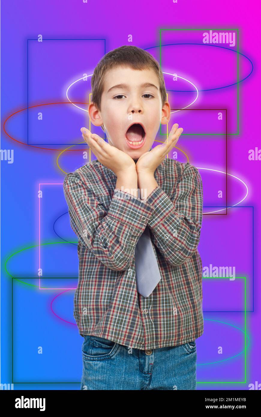 Scared and surprised six years old boy holding hands up to face and ...