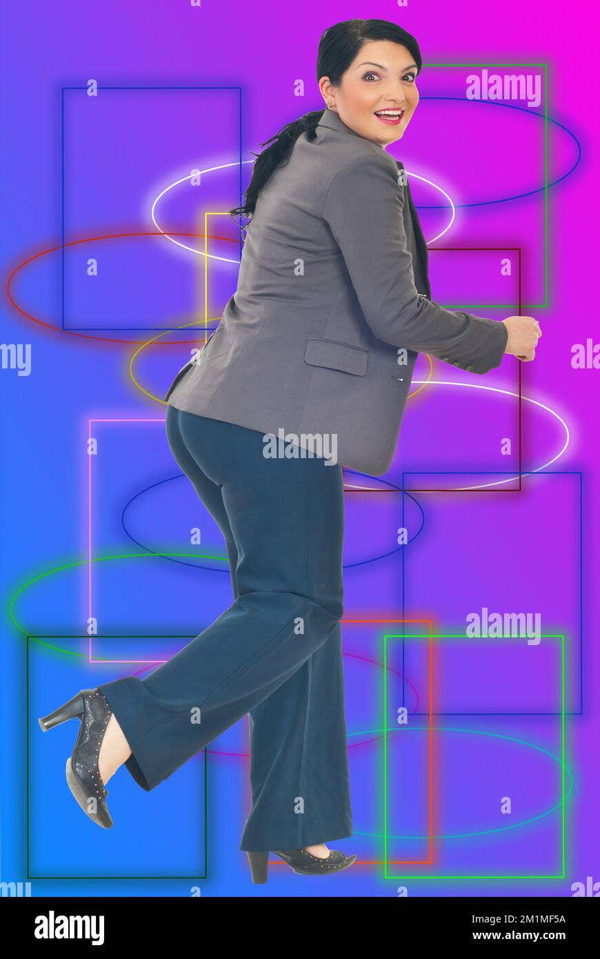 Full length of business woman running from something and looking back ...