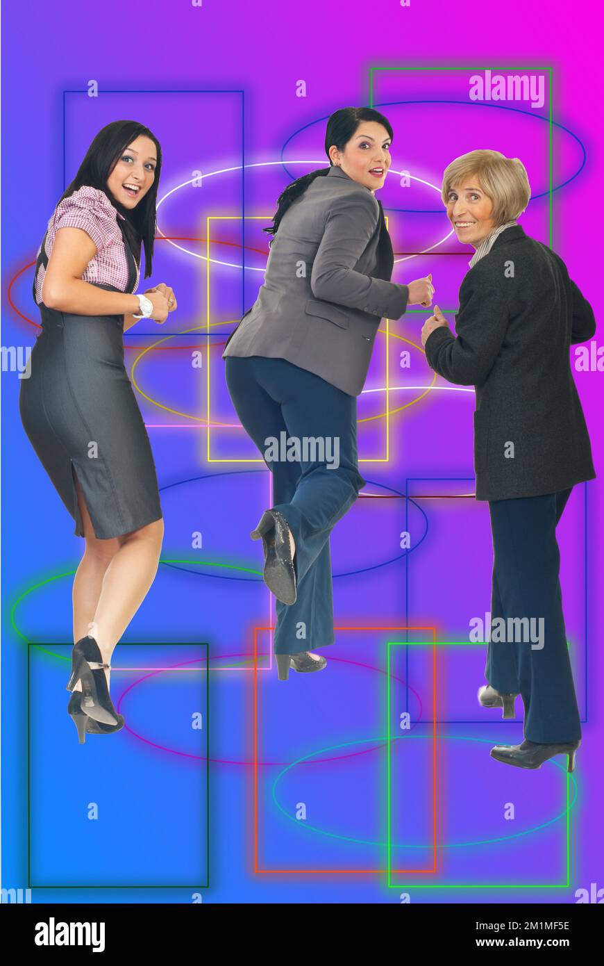 Rear view of three business women running from something or someone ...