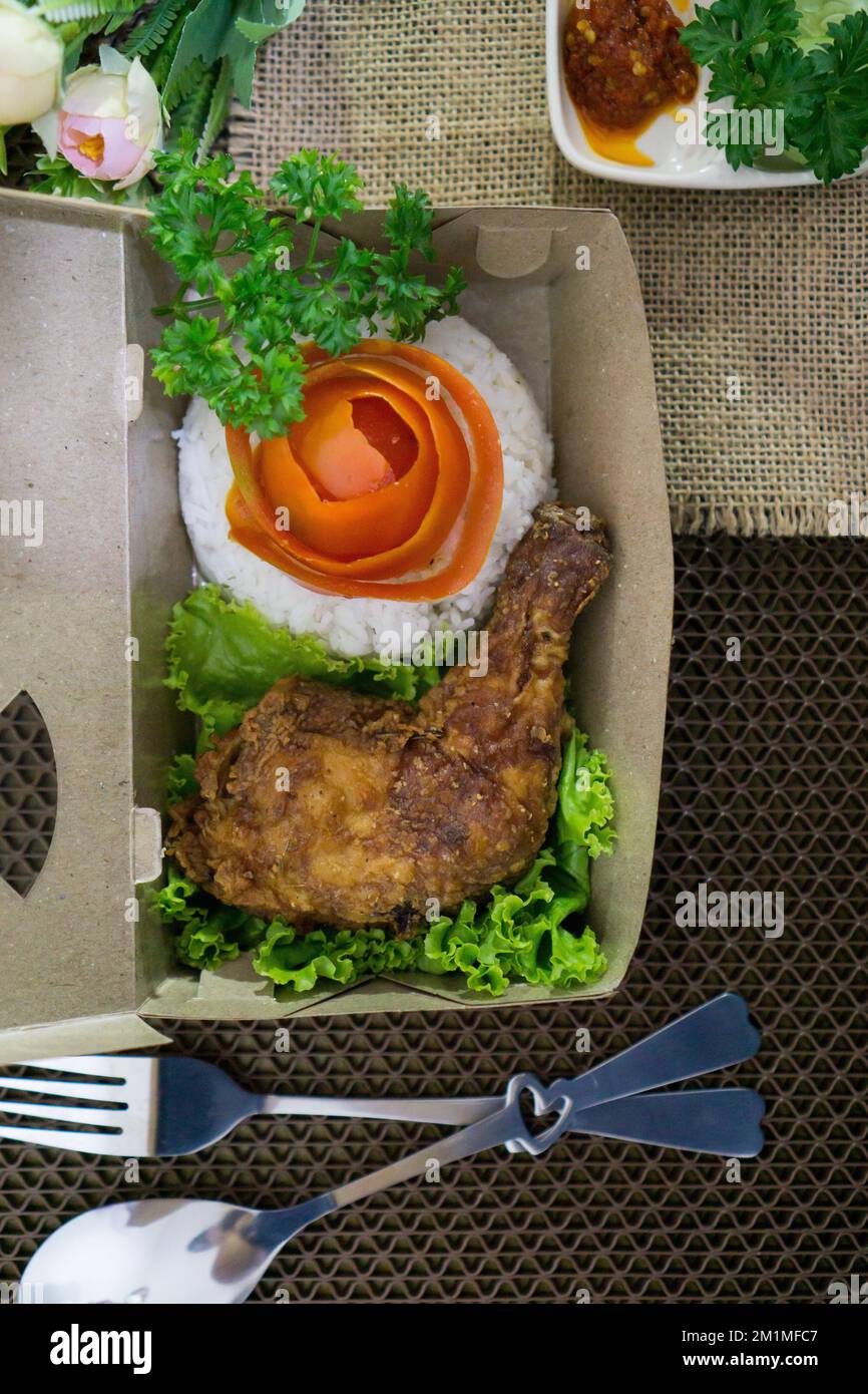 Homemade Indonesian Food, chicken butter with white rice, vegetables ...