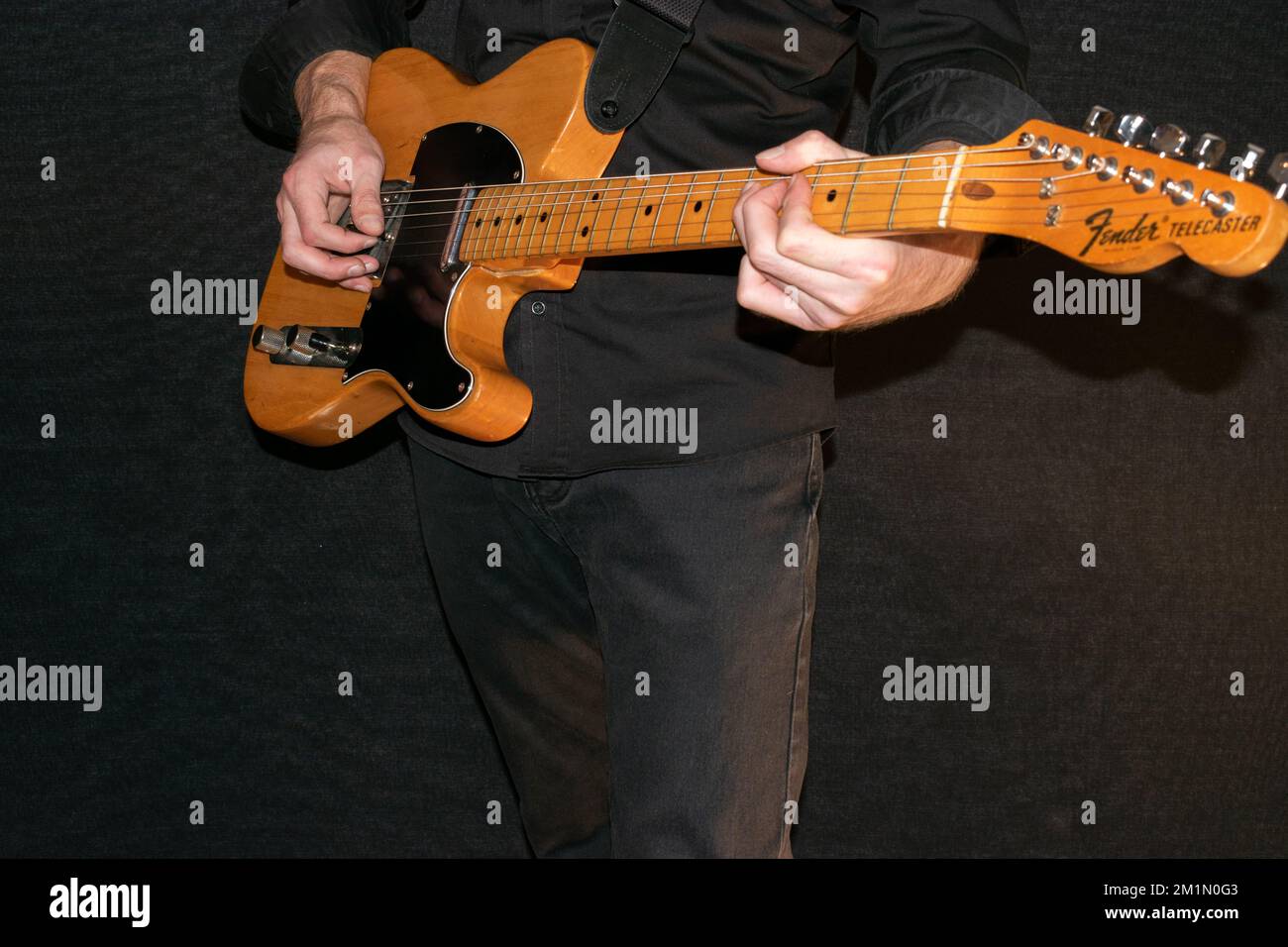 Vaduz, Liechtenstein, January 14, 2022 Artist is playing a Fender ...