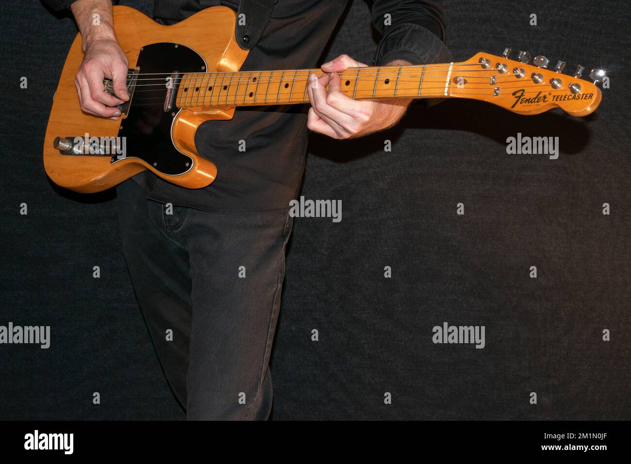 Vaduz, Liechtenstein, January 14, 2022 Artist is playing a Fender ...