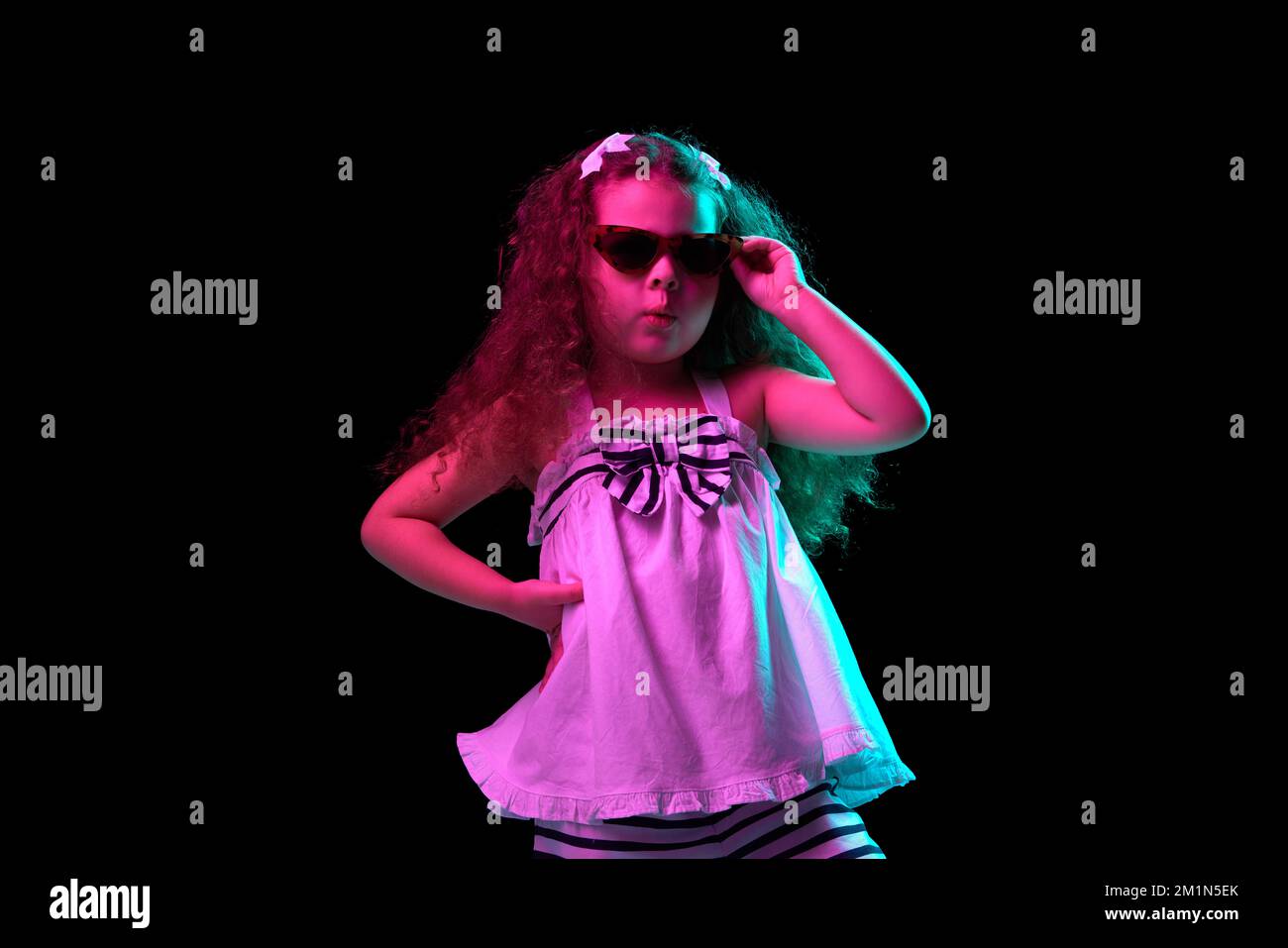 Summer vibes. Stylish little girl, beautiful kid wearing sunglasses ...