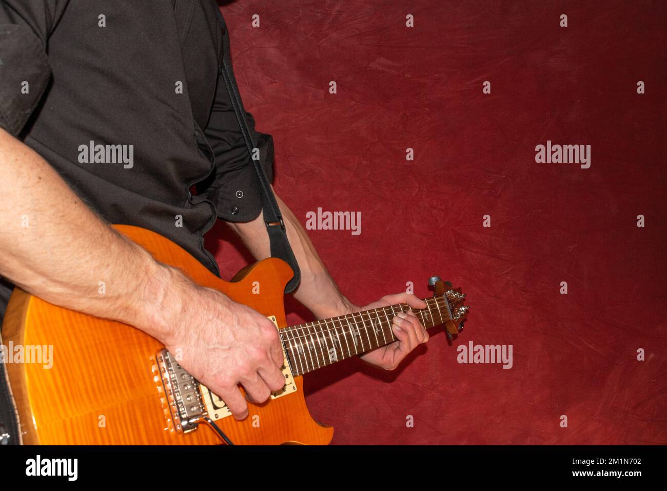 Vaduz, Liechtenstein, January 27, 2022 Artist is performing with a PRS ...