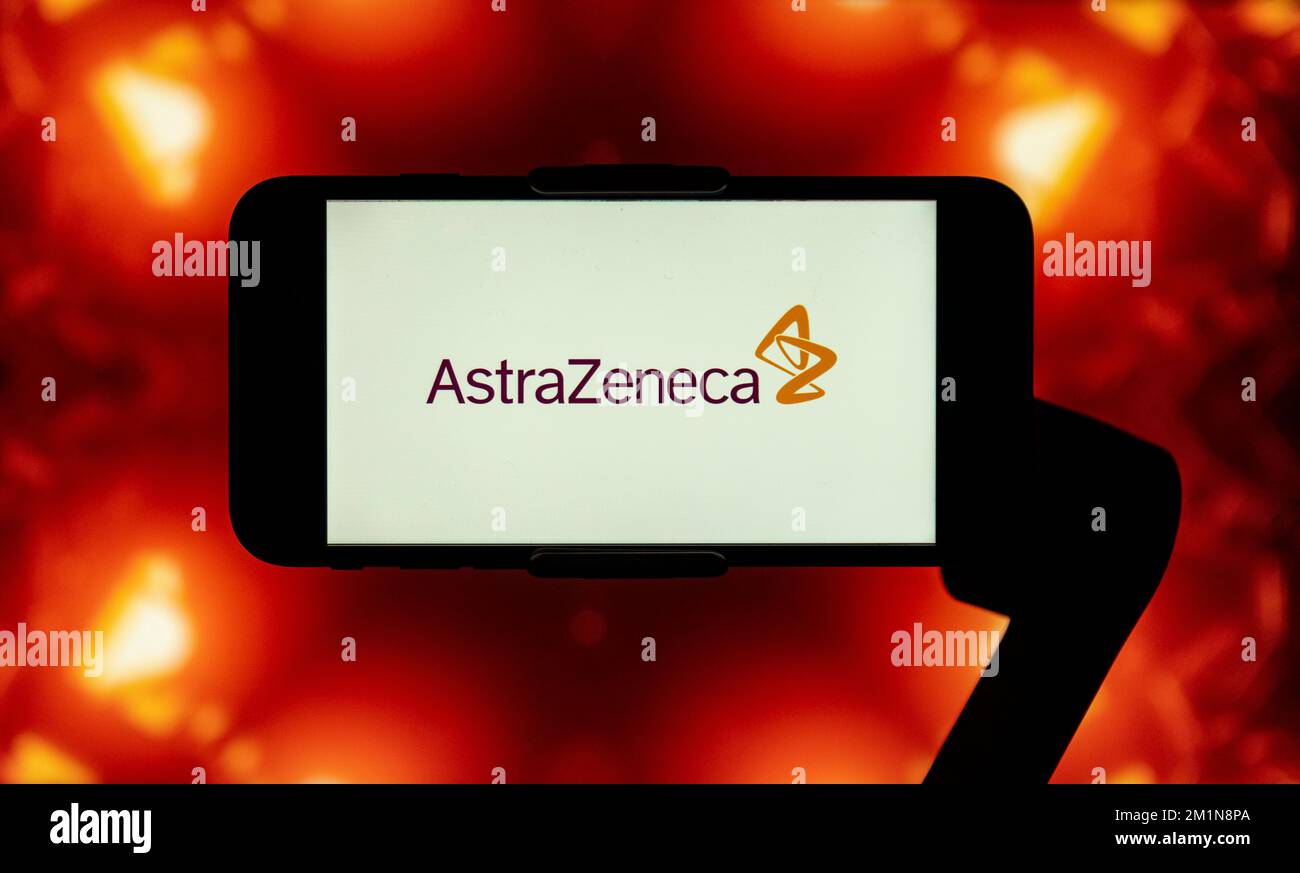 In this photo illustration, the logo of AstraZeneca is seen displayed ...