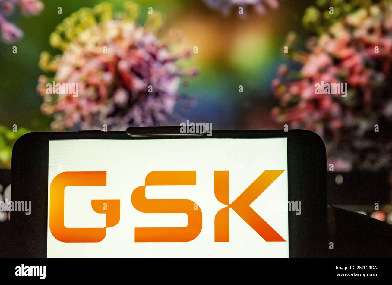 In this photo illustration, the logo of GlaxoSmithKline (GSK) is seen ...