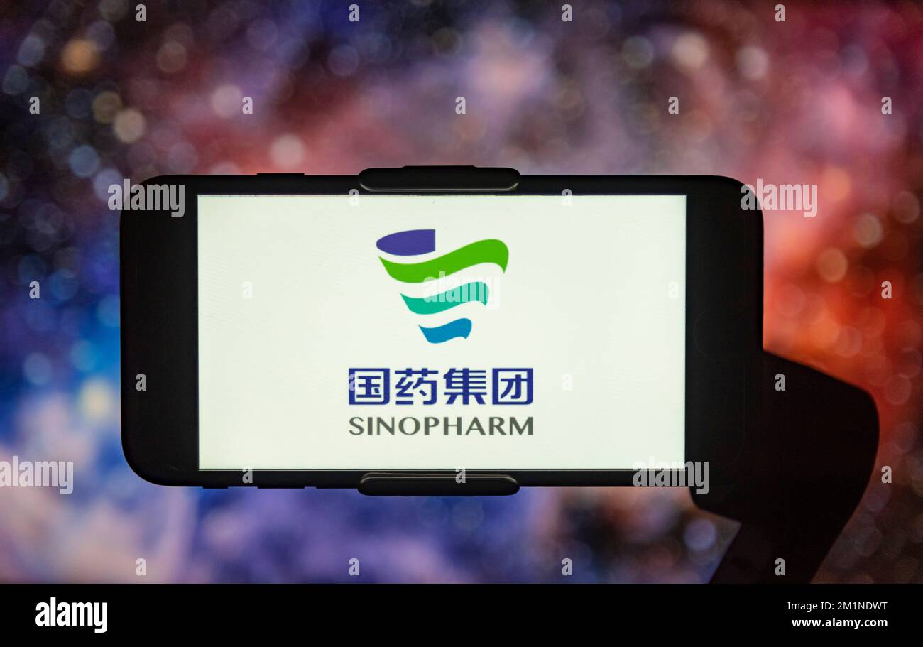 In this photo illustration, the logo of Sinopharm is seen displayed on a mobile phone screen ...